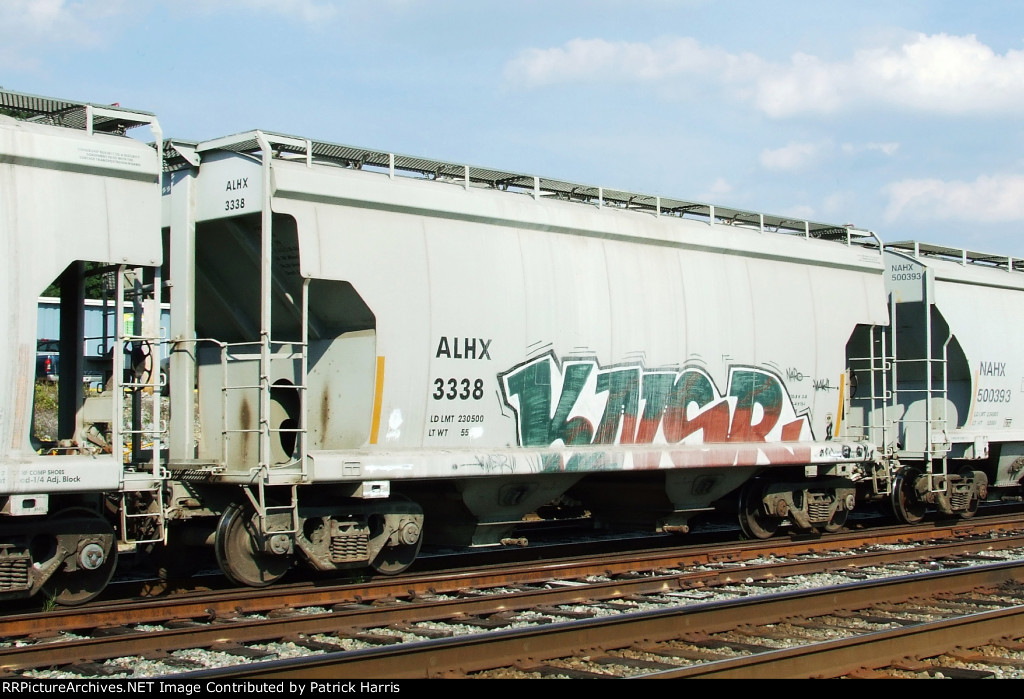 ALHX 3338 NSC 2-bay 3320cf covered hopper in the CSX Yard in Cartersville GA 08-16-2014